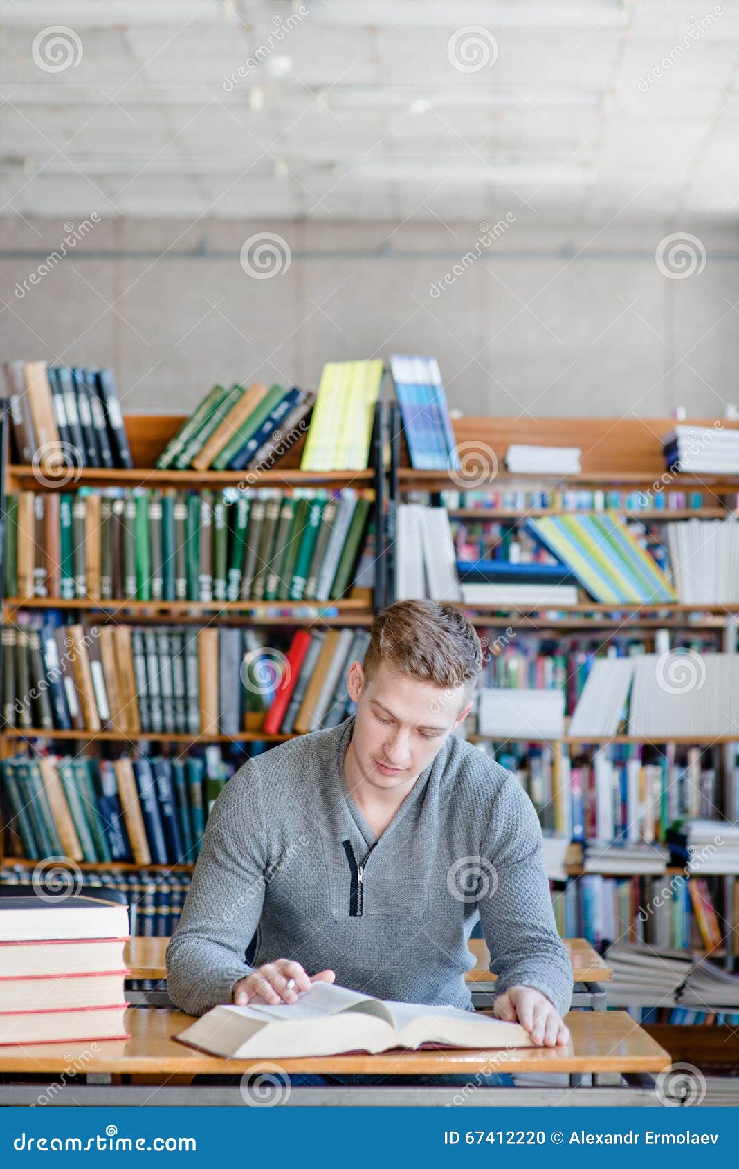 Male Student Preparing for the Exam in Library Stock Photo - Image of ...