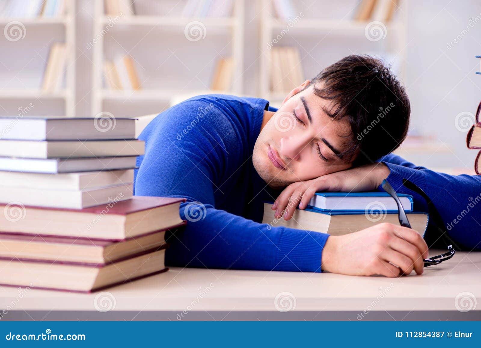 The Male Student Preparing for Exams in College Library Stock Image ...