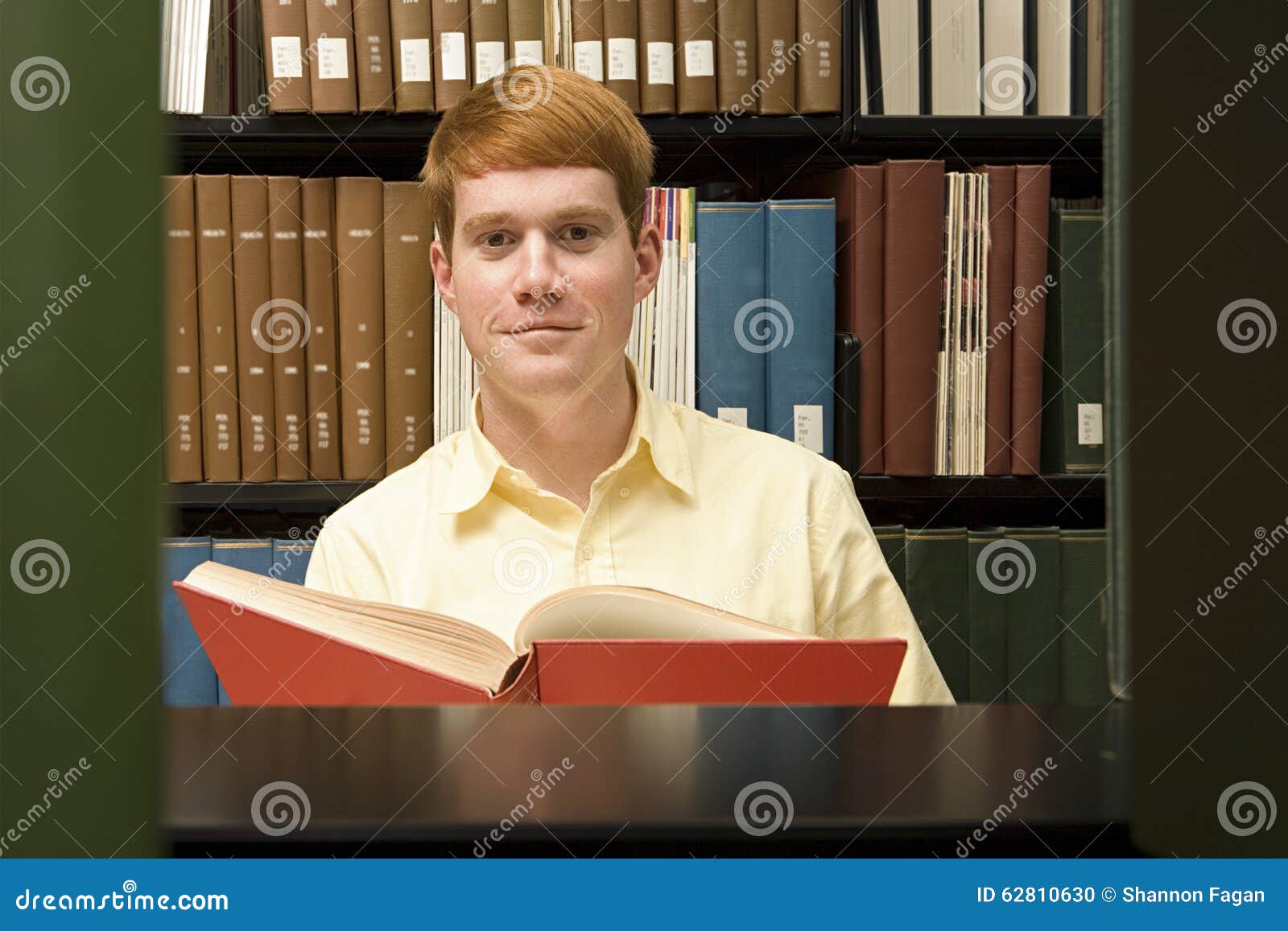 Male Student Reading in the Library Stock Photo - Image of ethnicity ...
