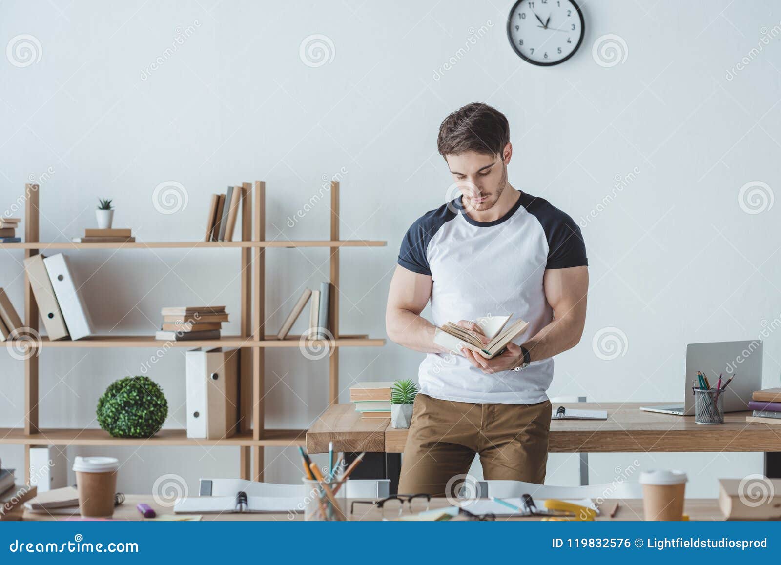 Male Student Studying with Book Stock Photo - Image of studying, people ...