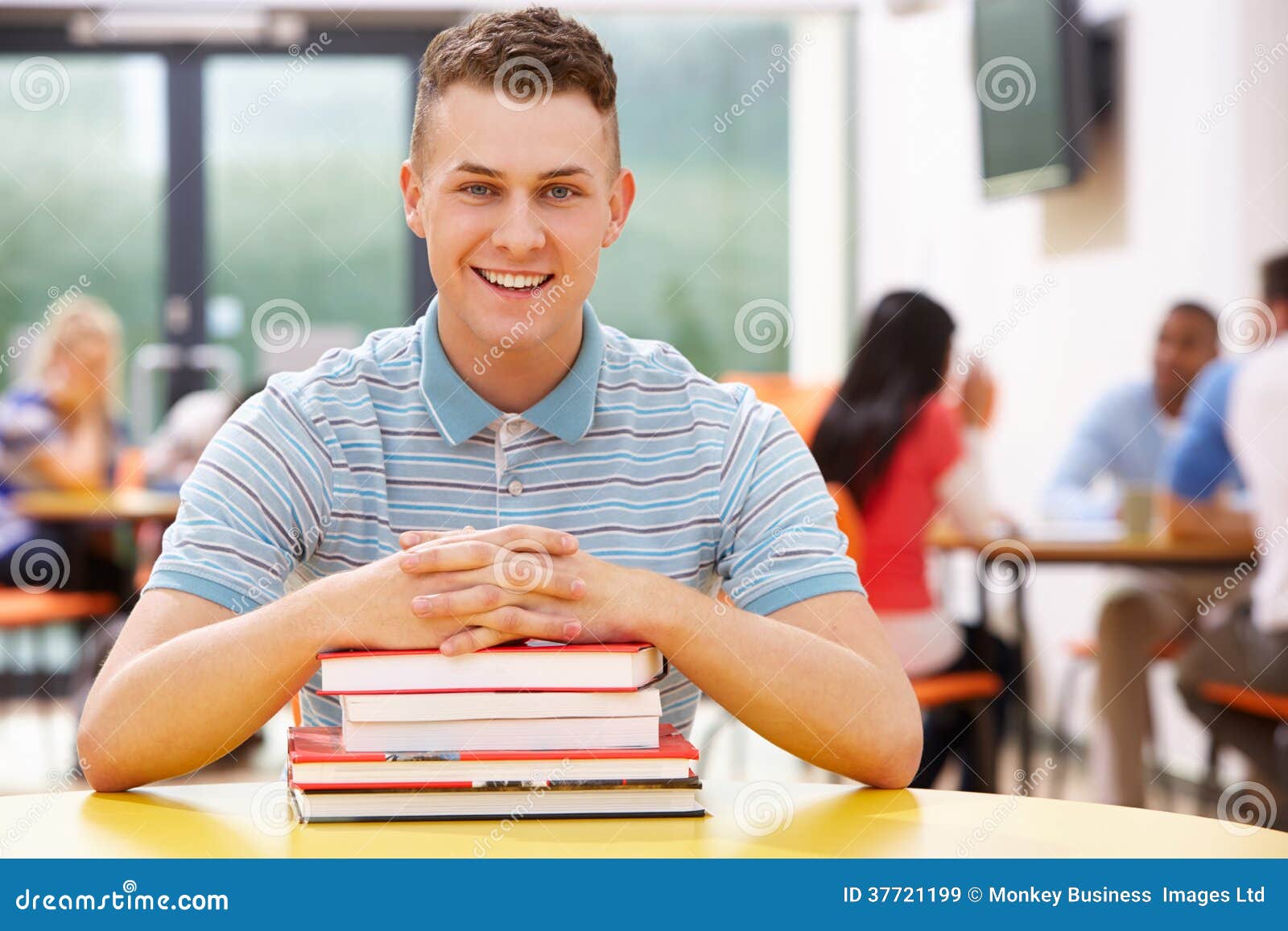 Male Student Studying in Classroom with Books Stock Image - Image of ...