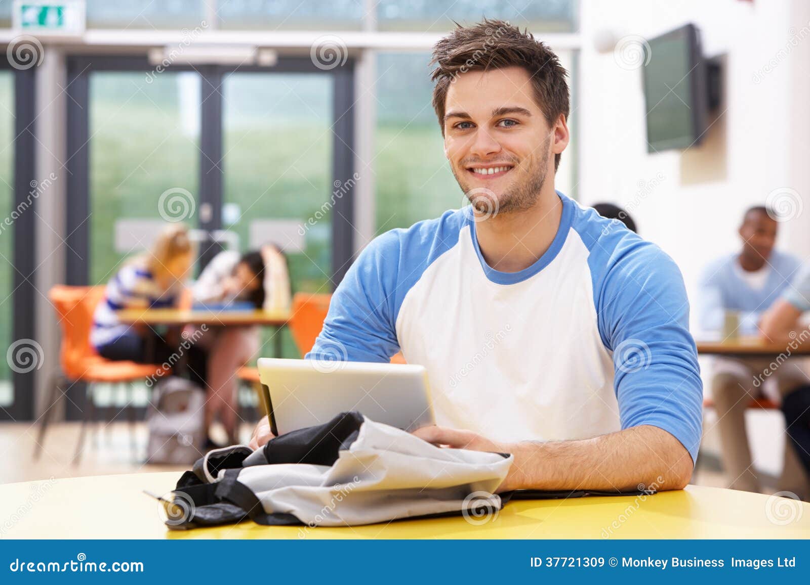 Male Student Studying in Classroom with Digital Tablet Stock Image ...