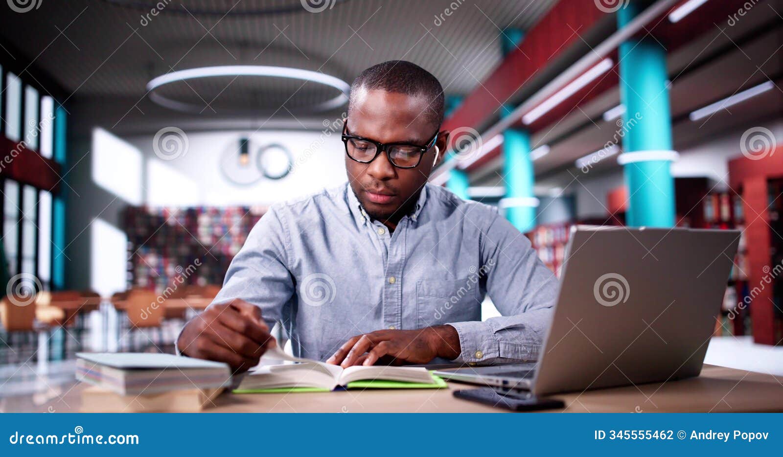 Male Student Studying with Computer Doing Research Stock Photo - Image ...