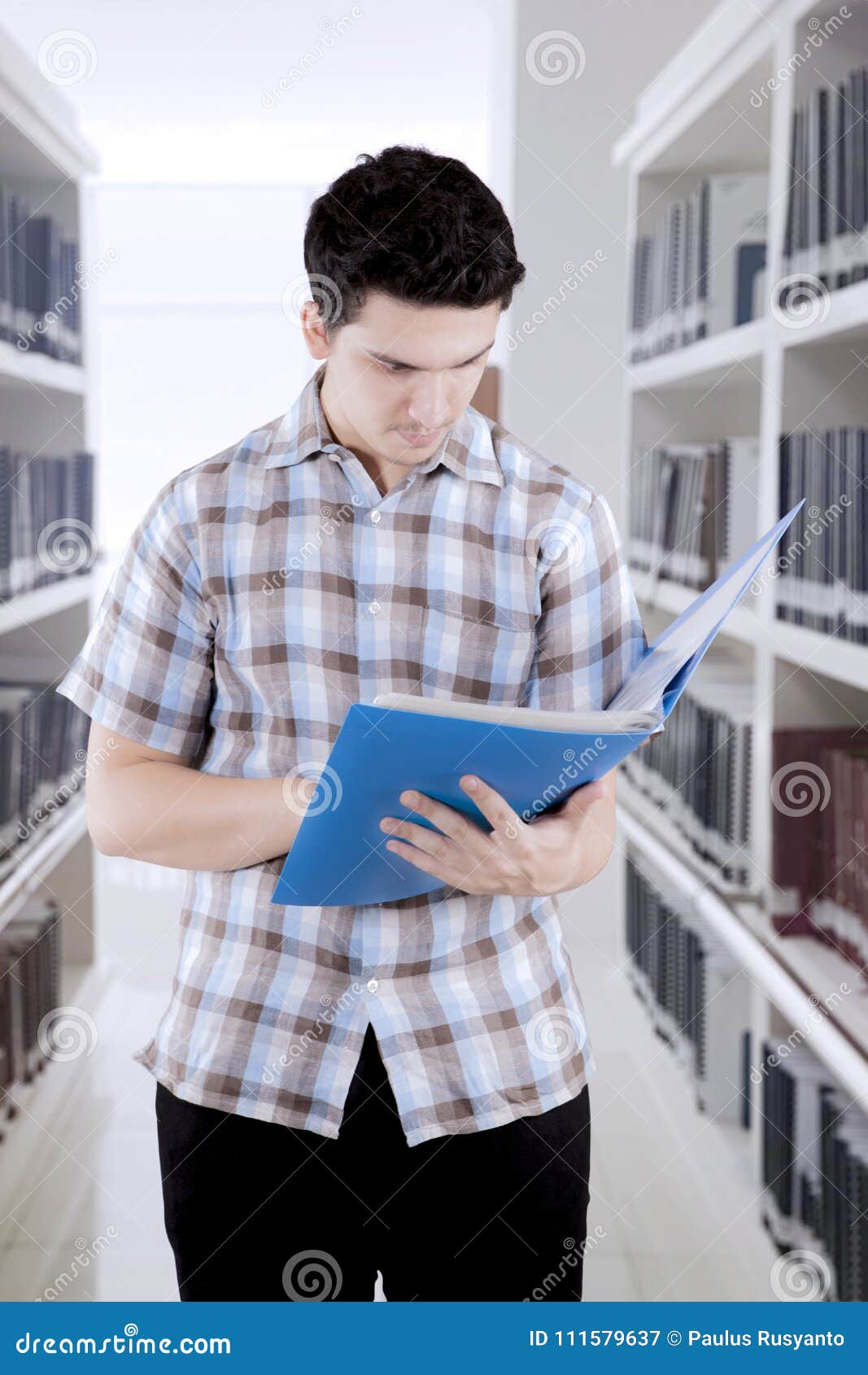 Male Student Studying in a Library Stock Image - Image of happy, data ...