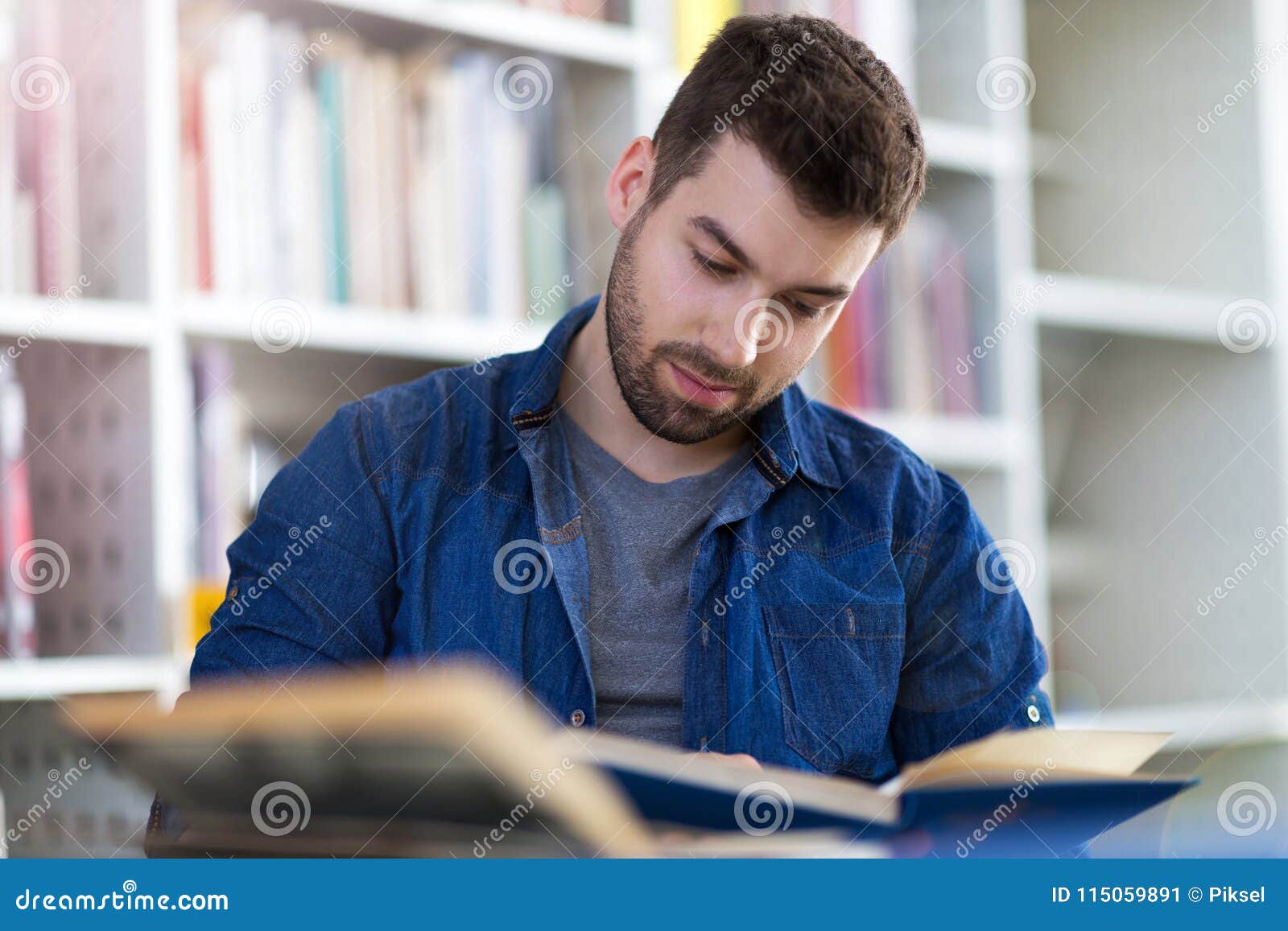 Male Student Studying in the Library Stock Image - Image of collage ...
