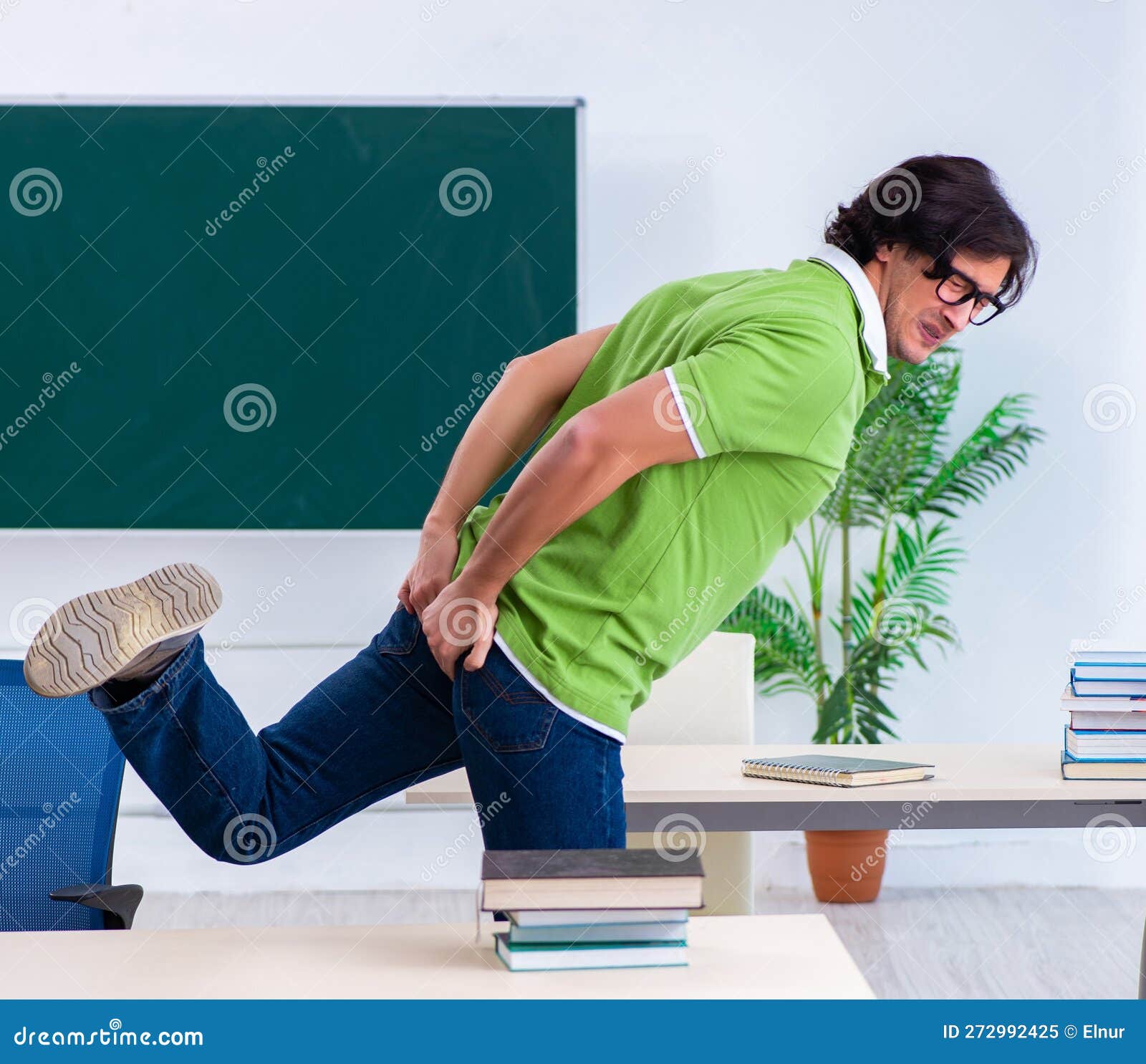 Male Student Suffering from Urge in the Classroom Stock Image - Image ...