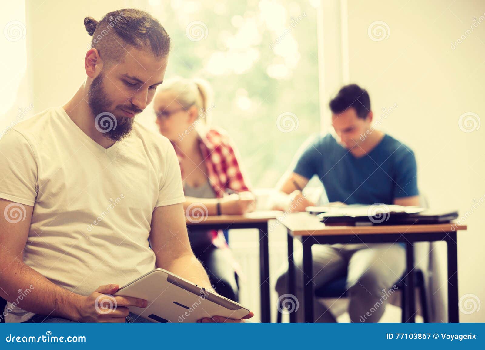 Male Student with Tablet in Front of Her Classmates Stock Image - Image ...