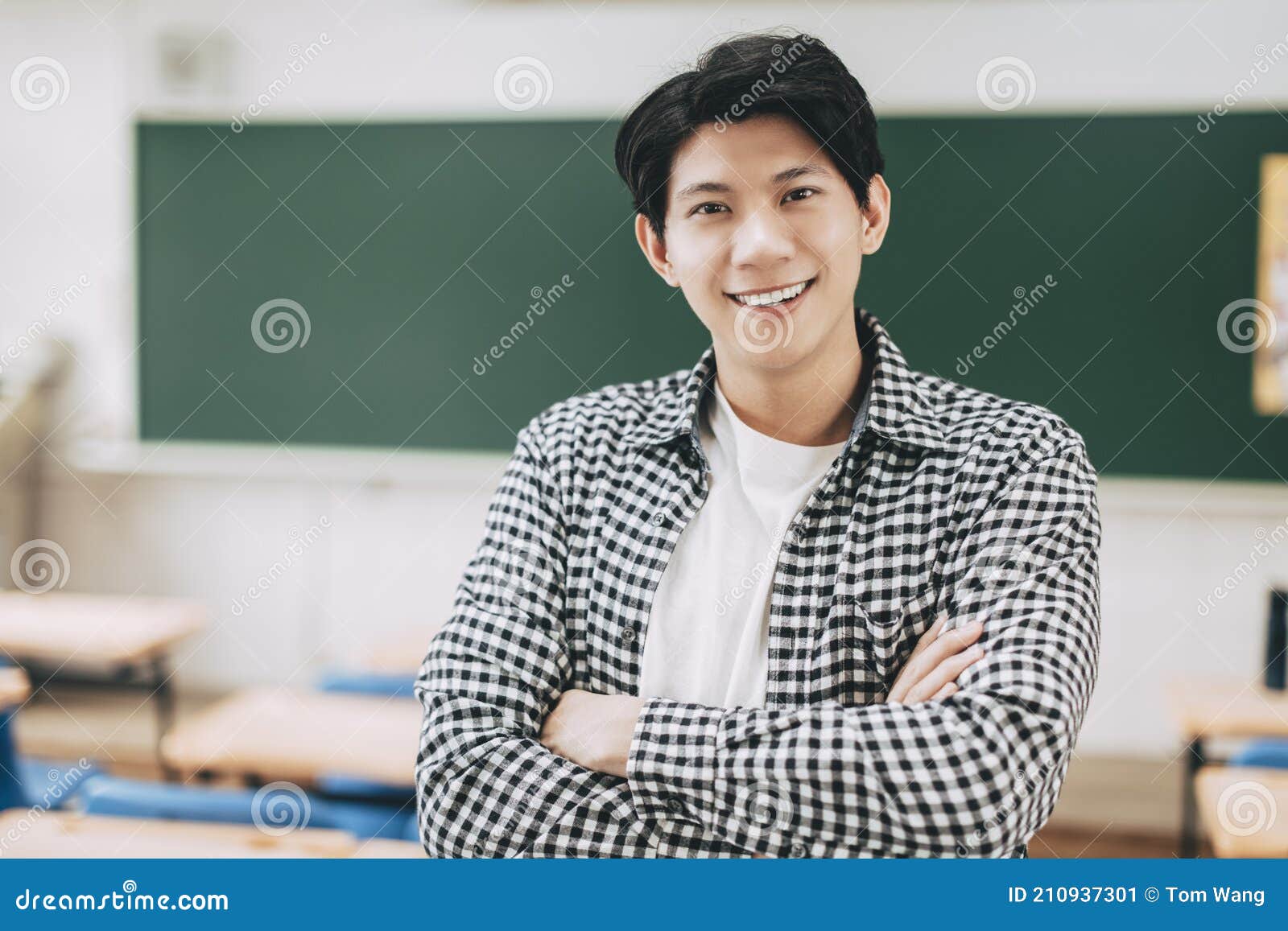 Male Student in University Classroom Looking at Camera and Smiling ...