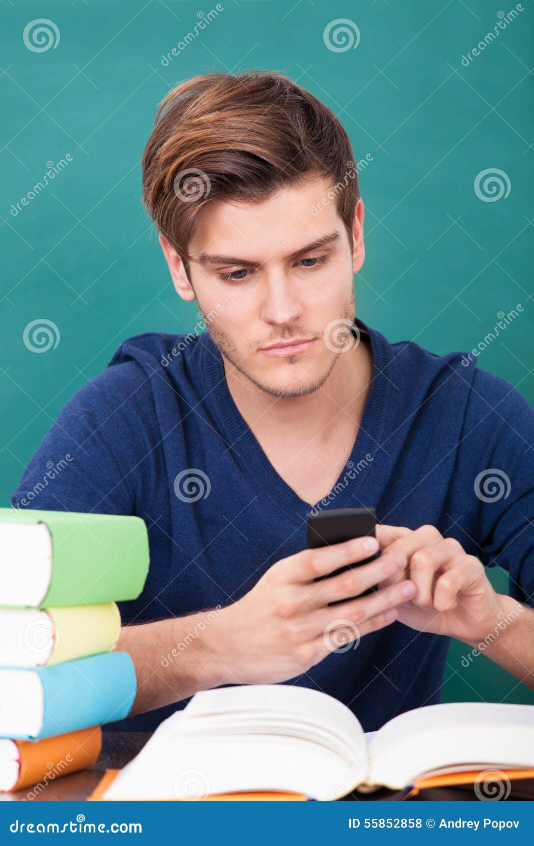Male Student Using Cellphone Stock Photo - Image of performance, person ...