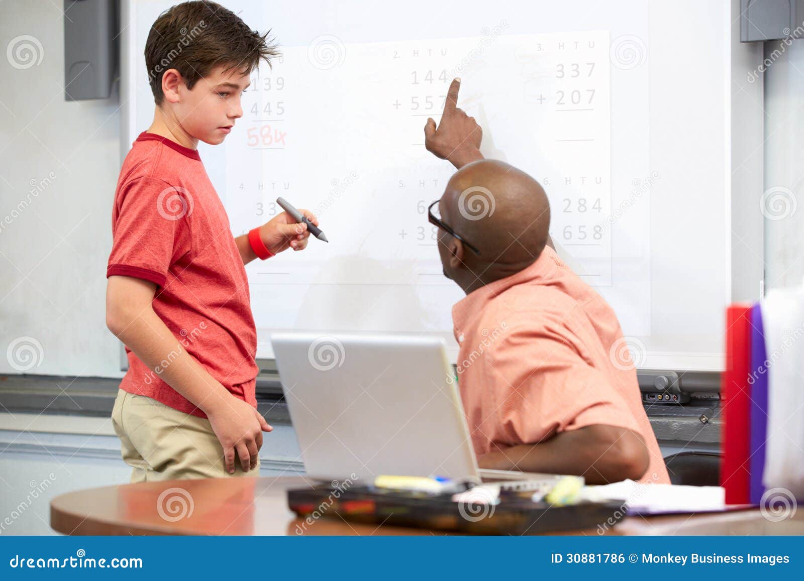 Male Student Writing Answer on Whiteboard Stock Photo - Image of school ...