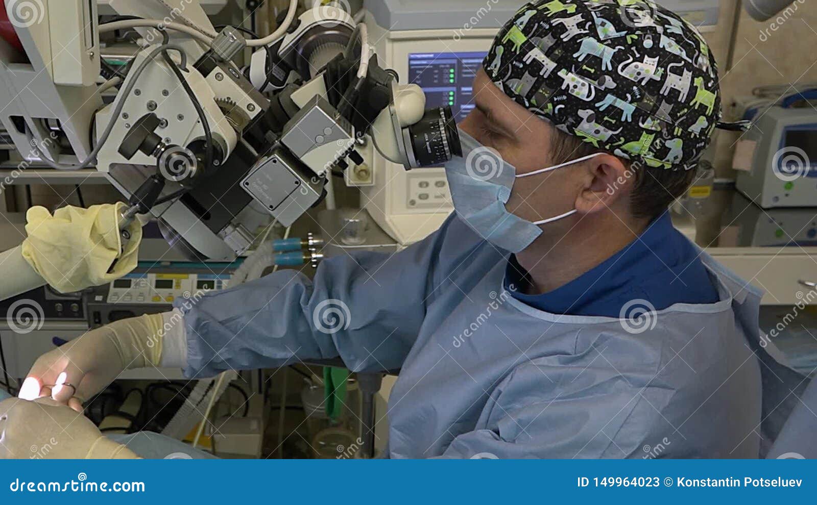Male Surgeon Doing Microscopic Surgery on ENT Organs Using a Surgical ...