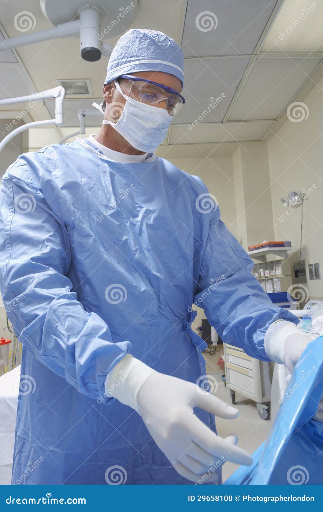 Male Surgeon in Operating Room Stock Photo - Image of hospital, adult ...