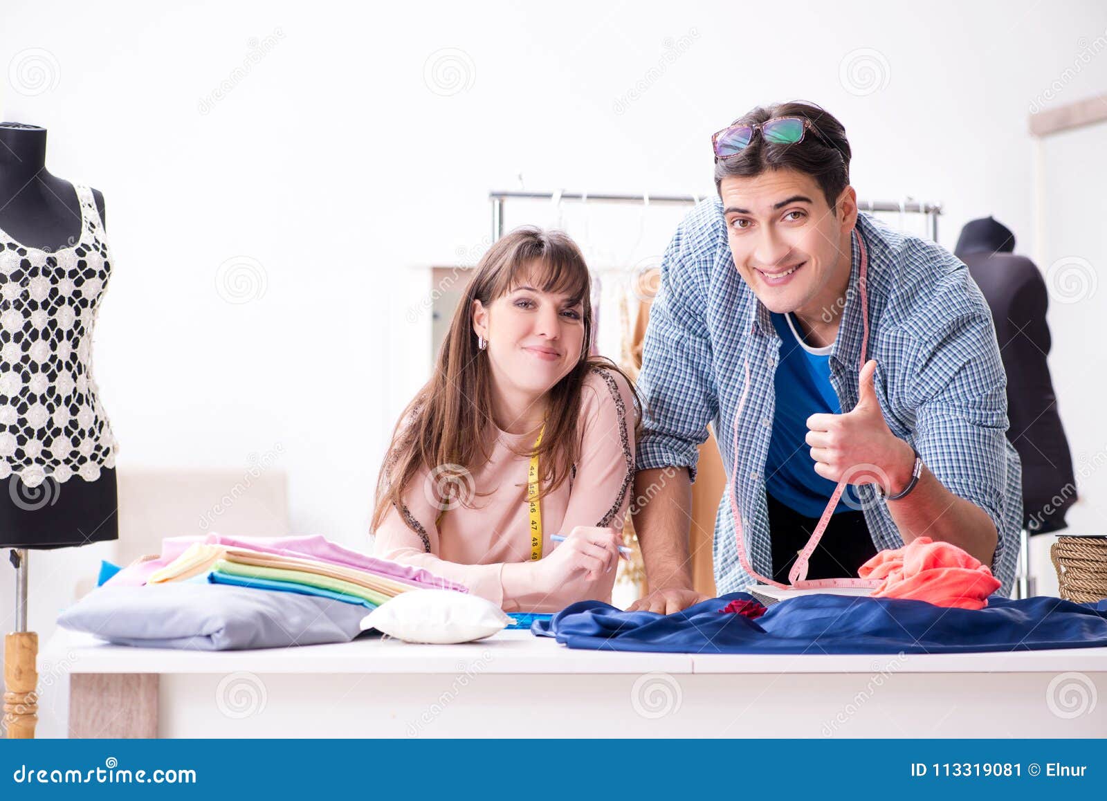 The Male Tailor with Female Student in Workshop Stock Image - Image of ...