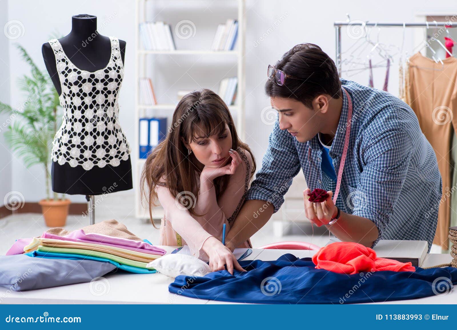 The Male Tailor with Female Student in Workshop Stock Image - Image of ...