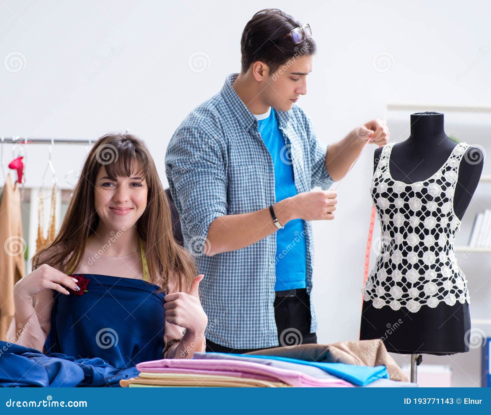 Male Tailor with Female Student in Workshop Stock Image - Image of ...