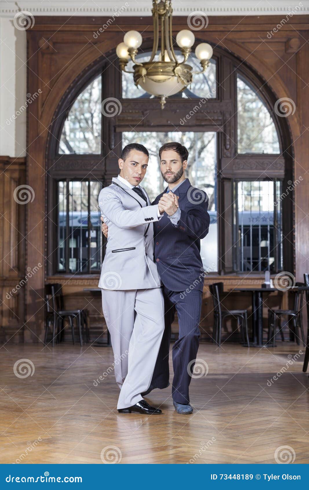 Male Tango Partners Performing in Restaurant Stock Image - Image of ...