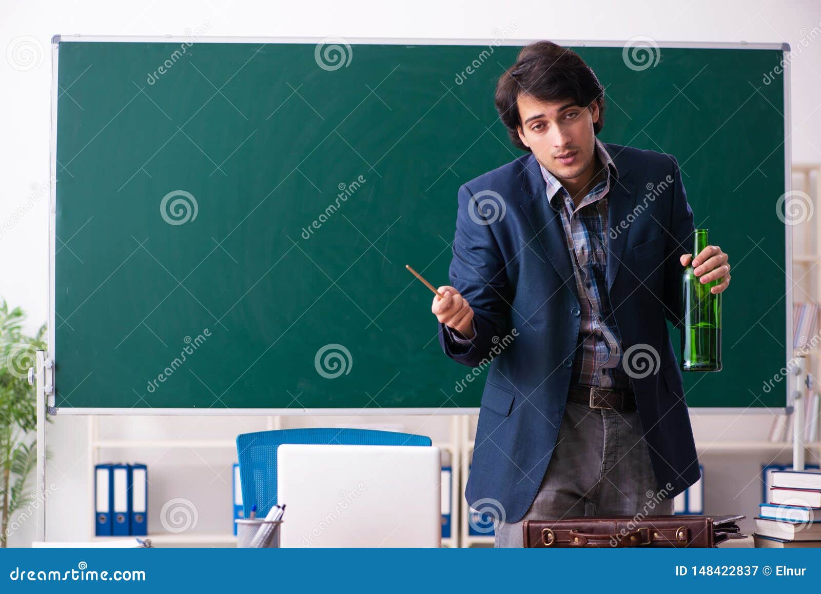 The Male Teacher Drinking in the Classroom Stock Image - Image of drunk ...
