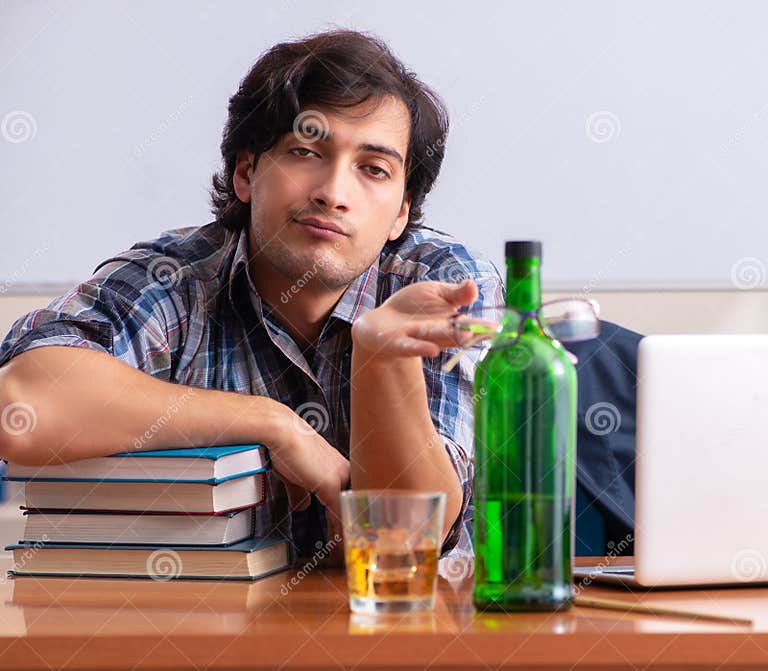 Male Teacher Drinking in the Classroom Stock Image - Image of drunk ...