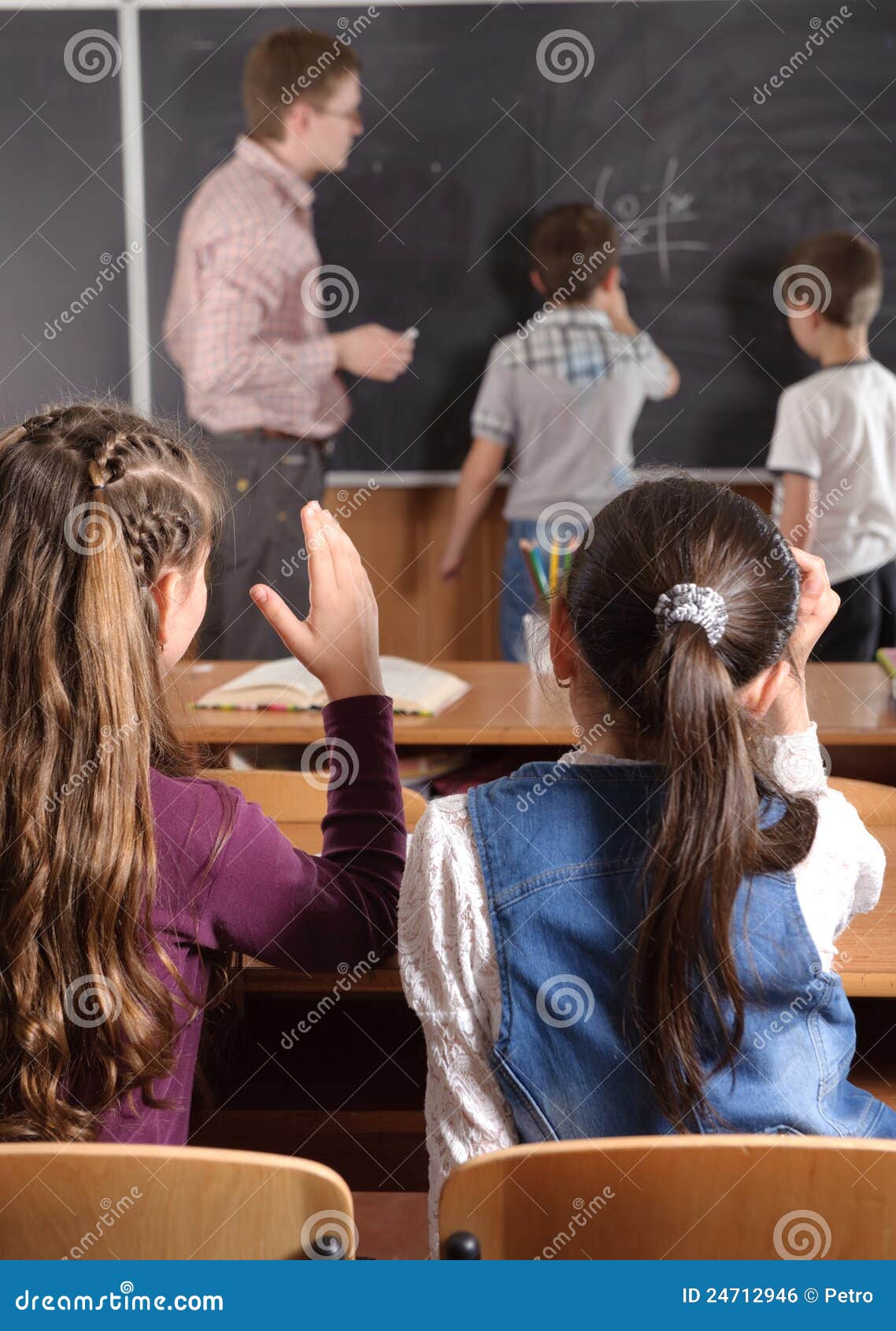 Male Teacher in Front of Elementary Age Pupils Stock Photo - Image of ...