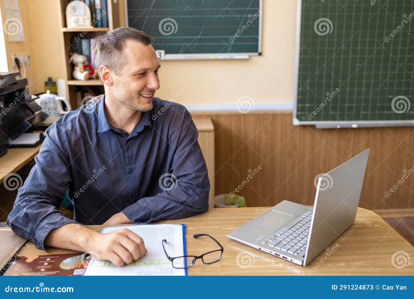 Male Teacher Having Online Class through Video Call and Explaining ...