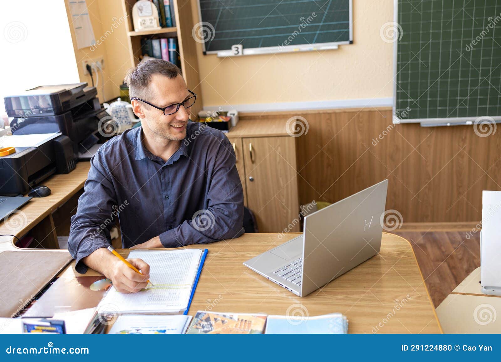 Male Teacher Having Online Class through Video Call and Explaining ...