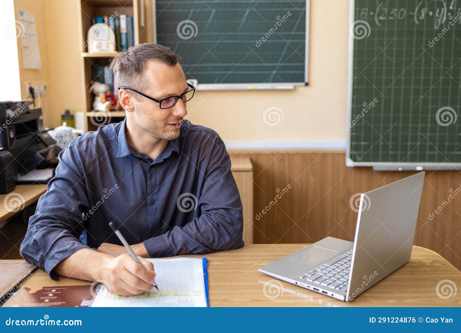 Male Teacher Having Online Class through Video Call and Explaining ...