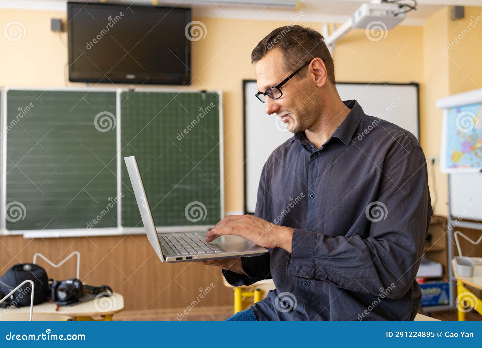 Male Teacher Having Online Class through Video Call and Explaining ...