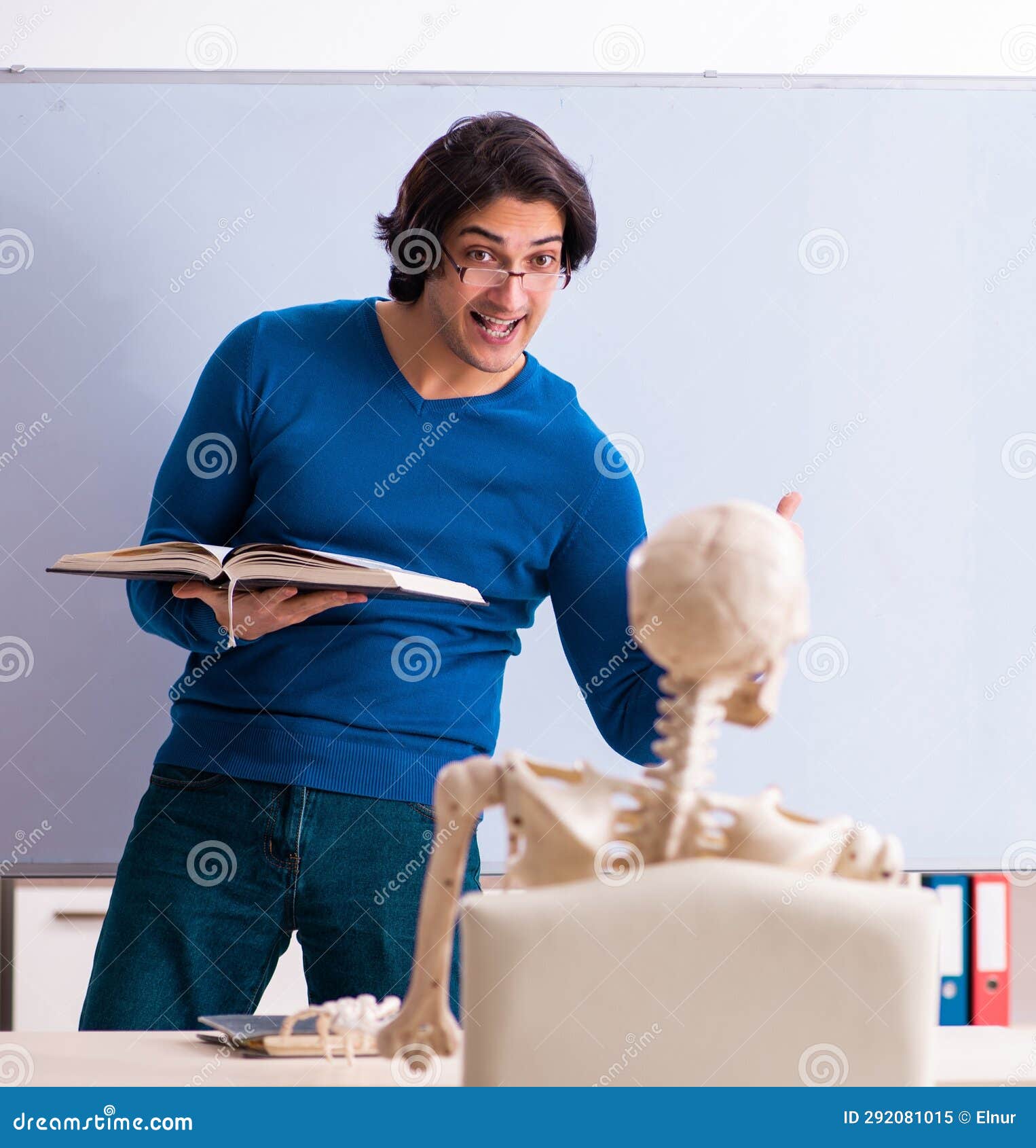 Male Teacher and Skeleton Student in the Classroom Stock Image - Image ...