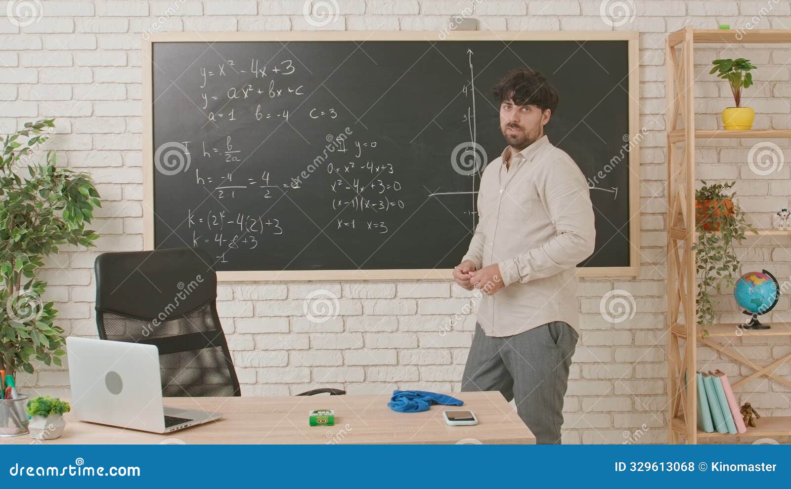 A Male Teacher Teaches a Geometry Lesson and Explains a Task Written on ...