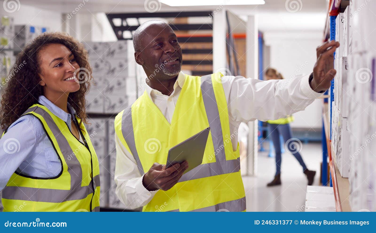 Male Team Leader with Digital Tablet in Warehouse Training Intern ...