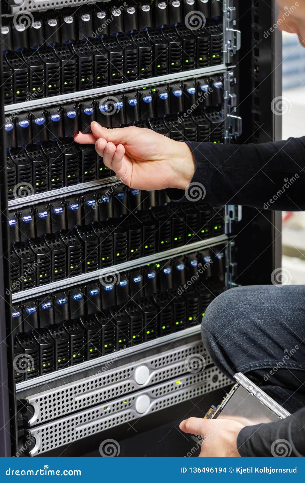 Male Technical Consultant Checking SAN Array in Datacenter Stock Photo ...