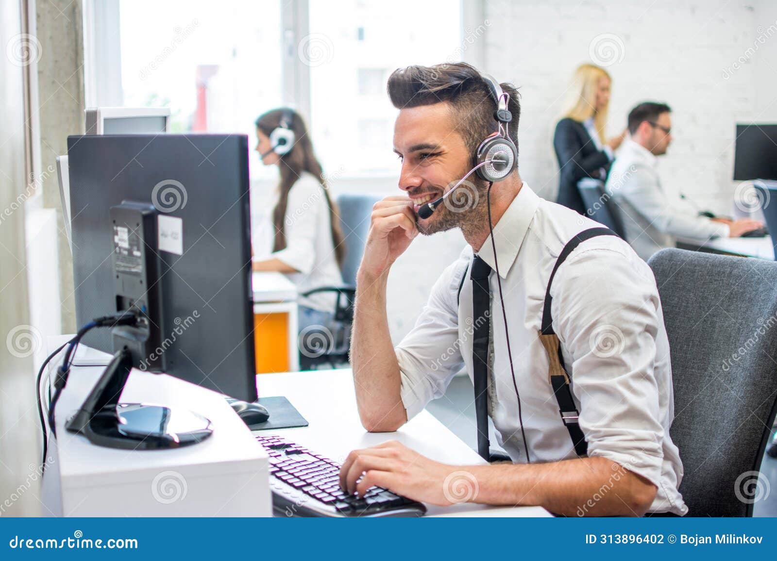 Male Technical Support Agent with Headset Talking with Customer in Call ...