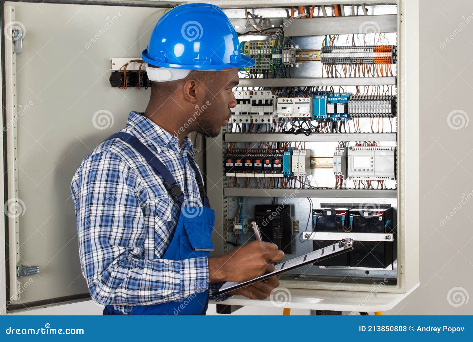 Male Technician Holding Clipboard Stock Photo - Image of male ...