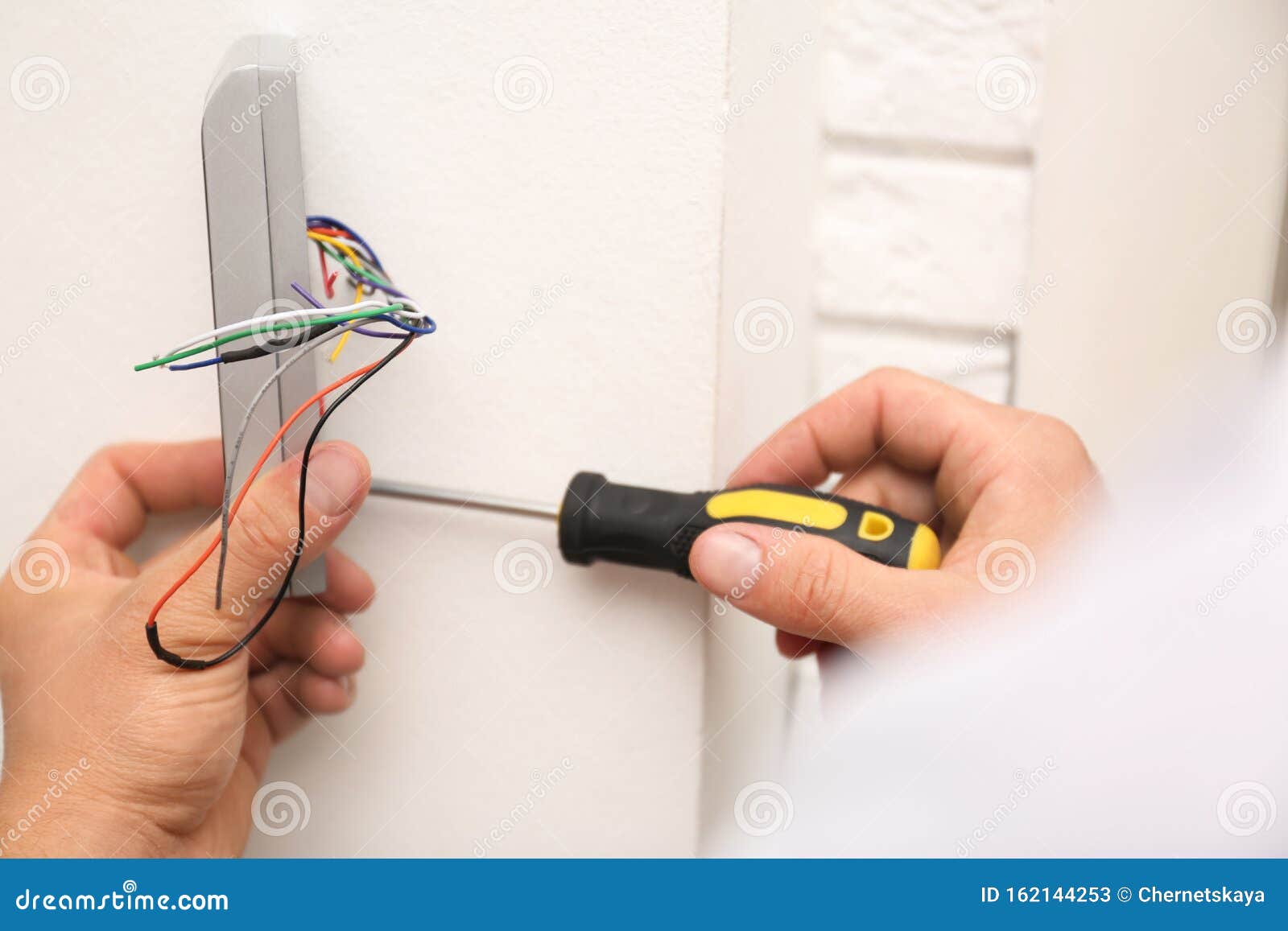 Male Technician Installing Security Alarm System Indoors Stock Image ... Male Technician Installing Security Alarm System Indoors Stock Image ...