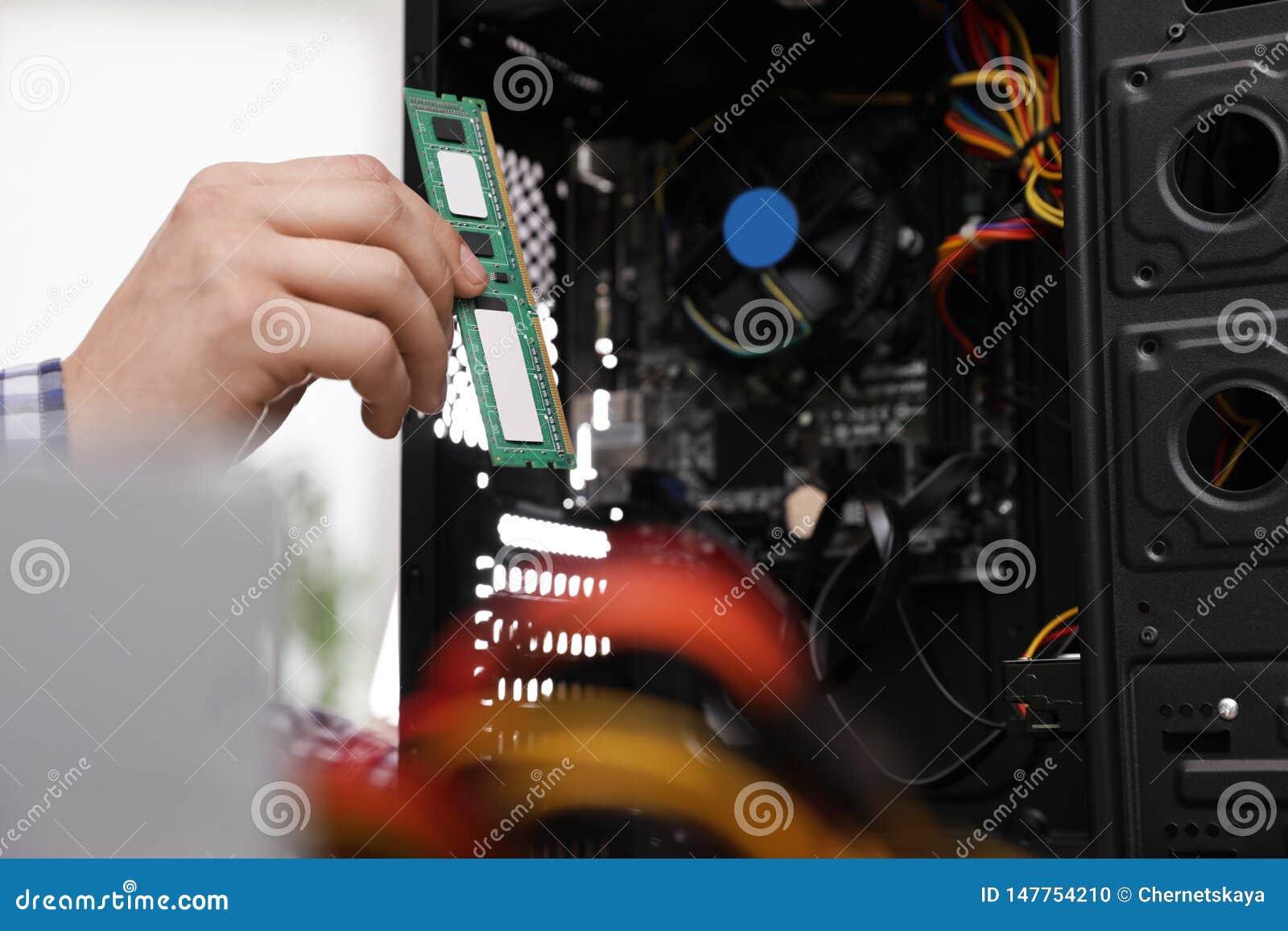 Male Technician Putting RAM Chip into System Unit, Closeup. Stock Photo ...