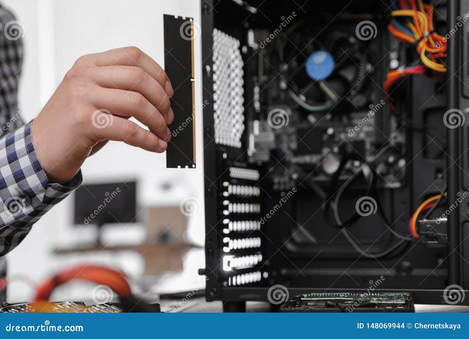 Male Technician Putting RAM Chip into System Unit. Computer Repair ...