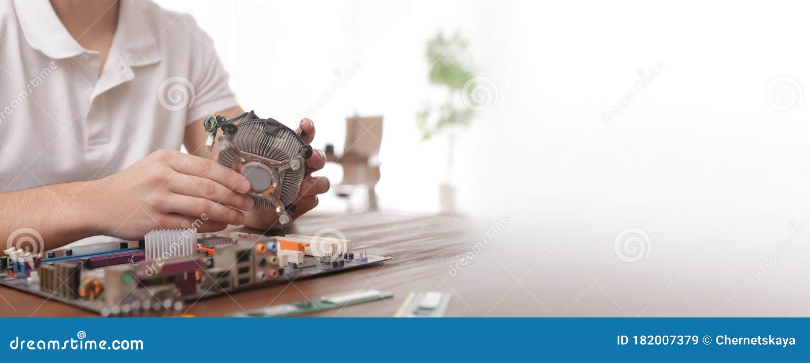 Male Technician Repairing Computer at Table, Space for Text. Banner ...