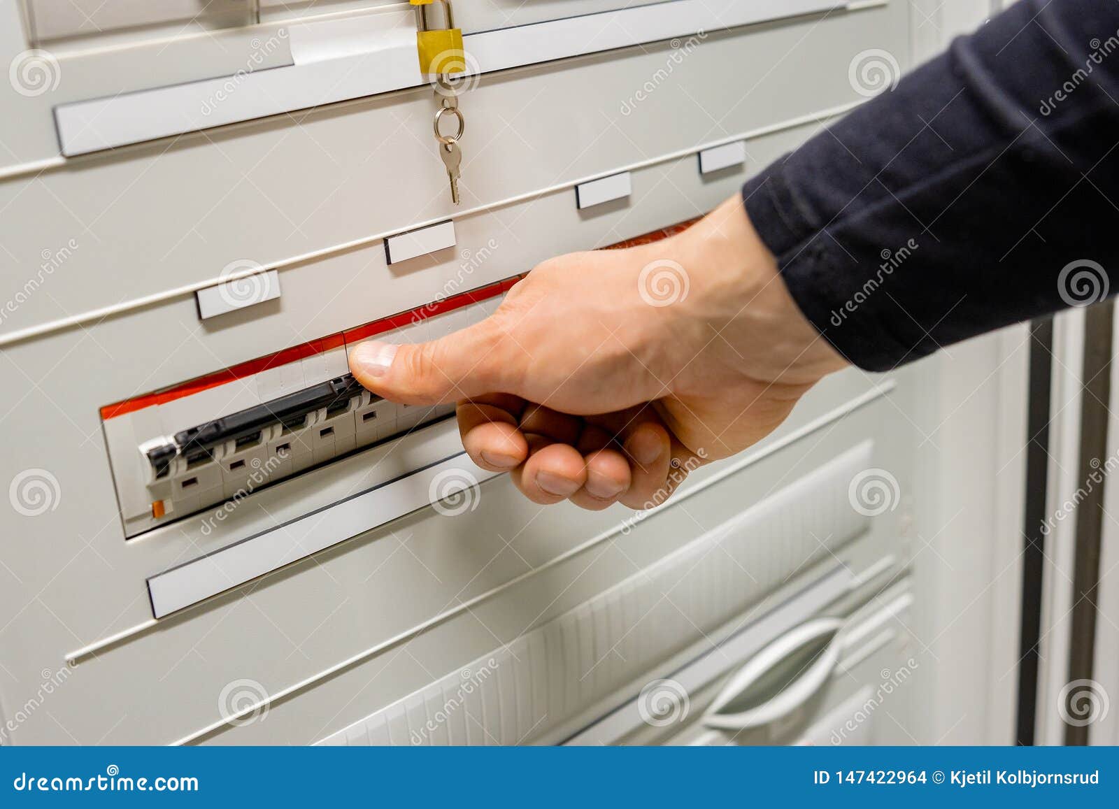 Male Technician Touching Electric Fuse at Datacenter Stock Photo ...