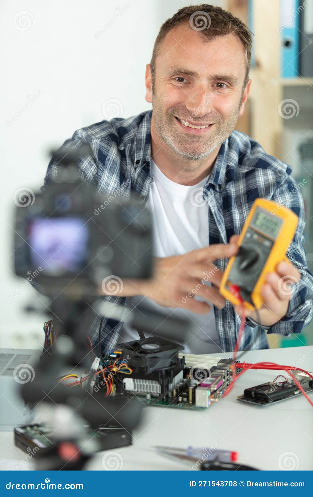 Male Technician Using Camera To Make Tutorial Stock Photo - Image of ...