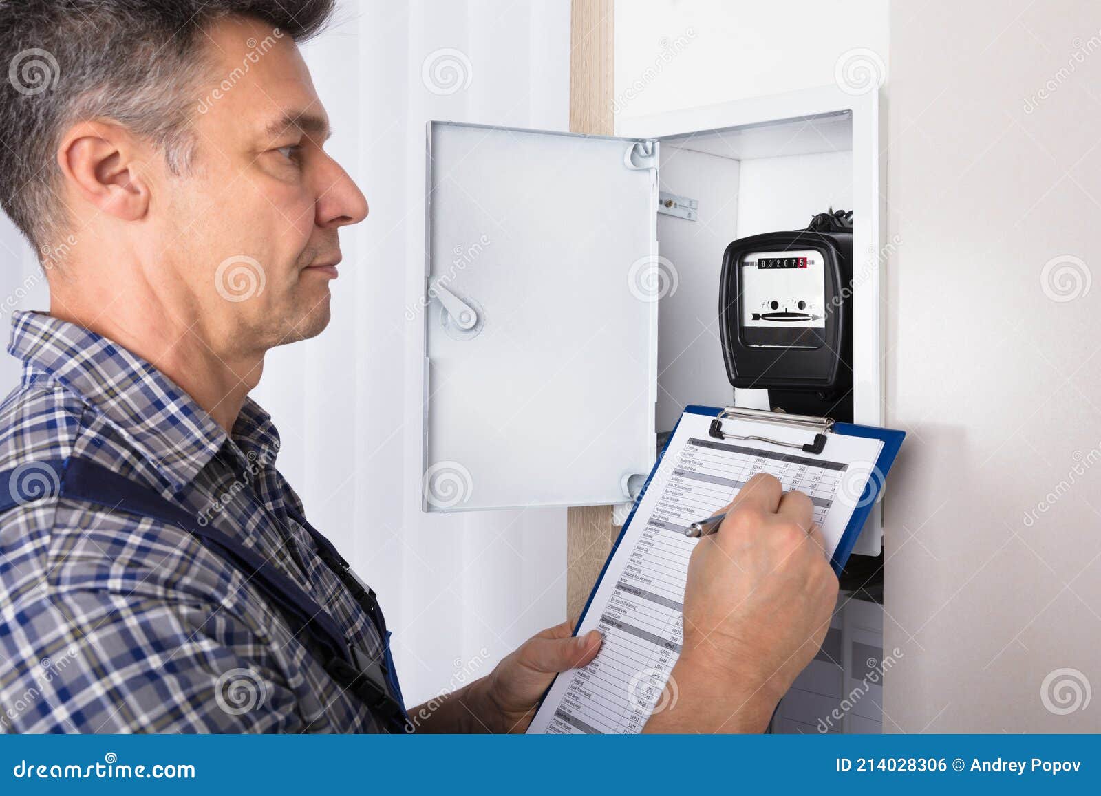 Male Technician Writing Reading of Meter Stock Photo - Image of adult ...
