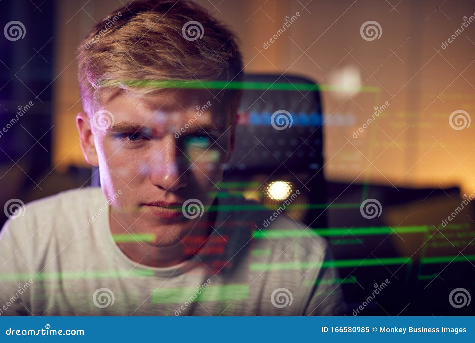 Male Teenage Hacker with Data Reflected from Computer Screen Stock ...