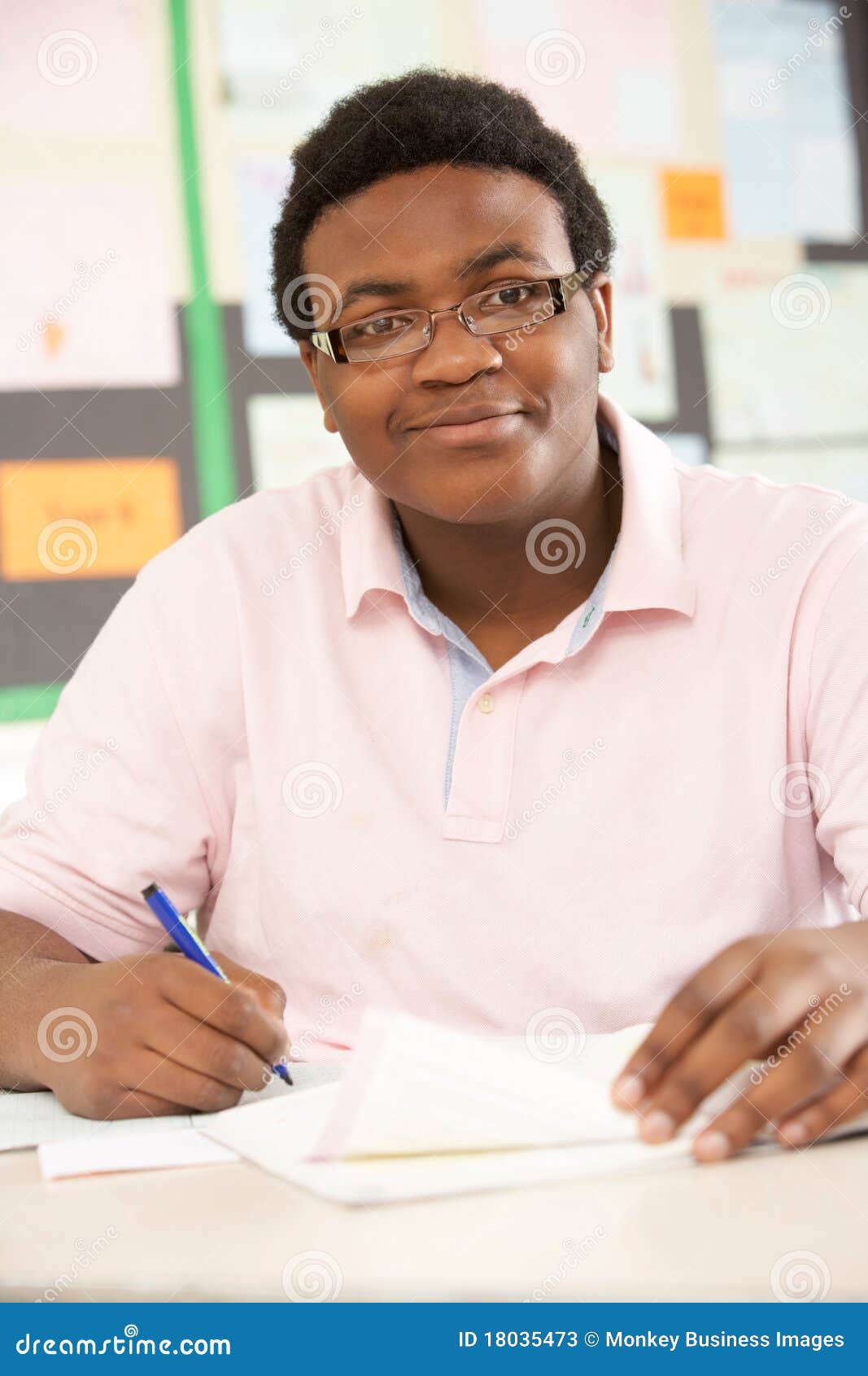 Male Teenage Student Studying in Classroom Stock Image - Image of male ...