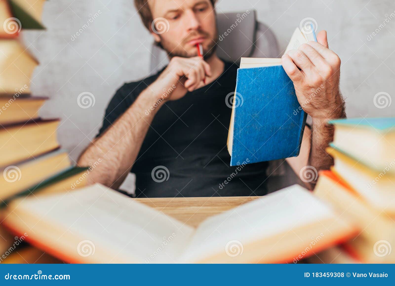 Male Thinker Philosopher Thoughtfully Reads into the Pages of an Old ...