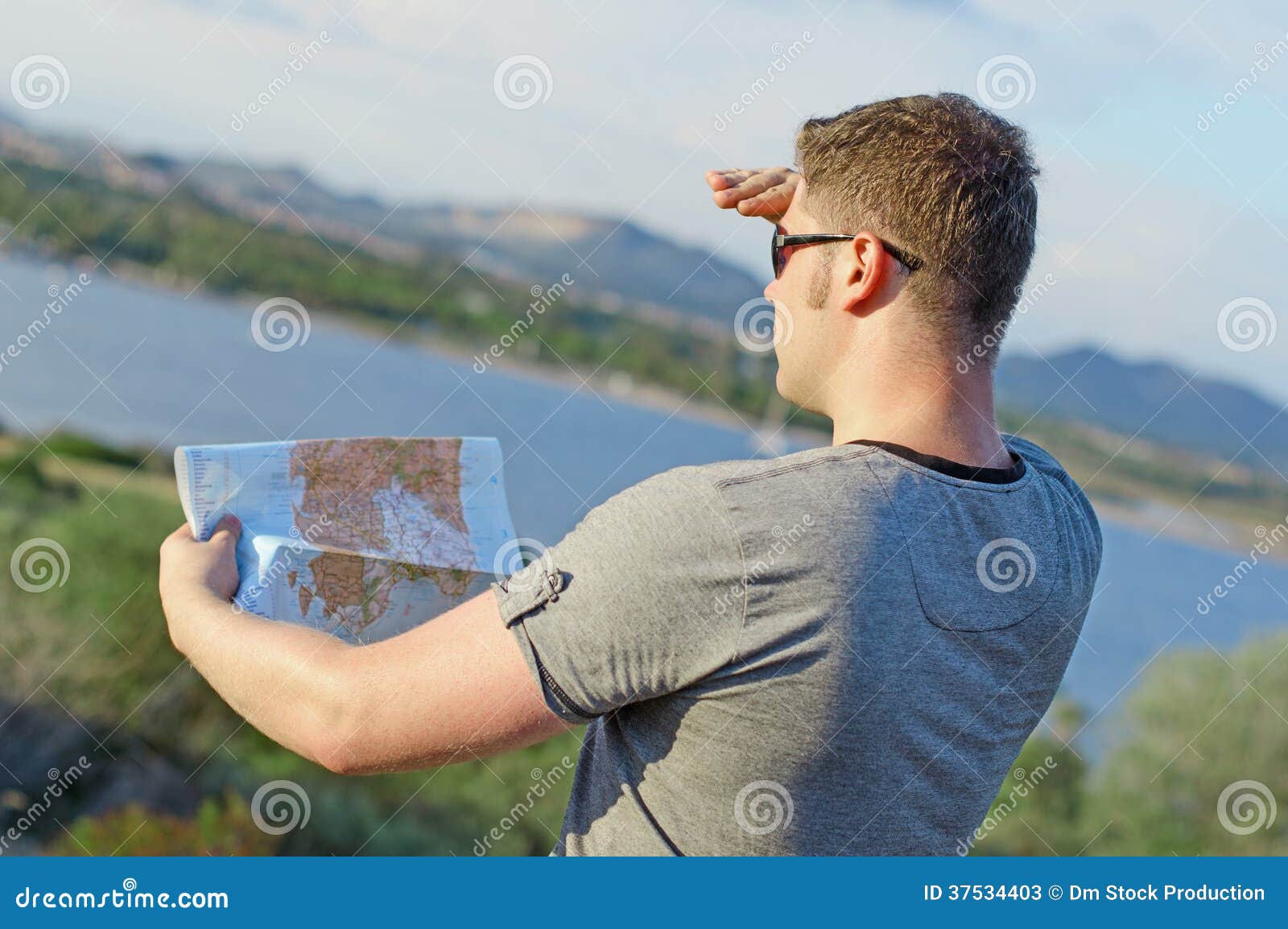 Male tourist with map. stock image. Image of hike, guide - 37534403