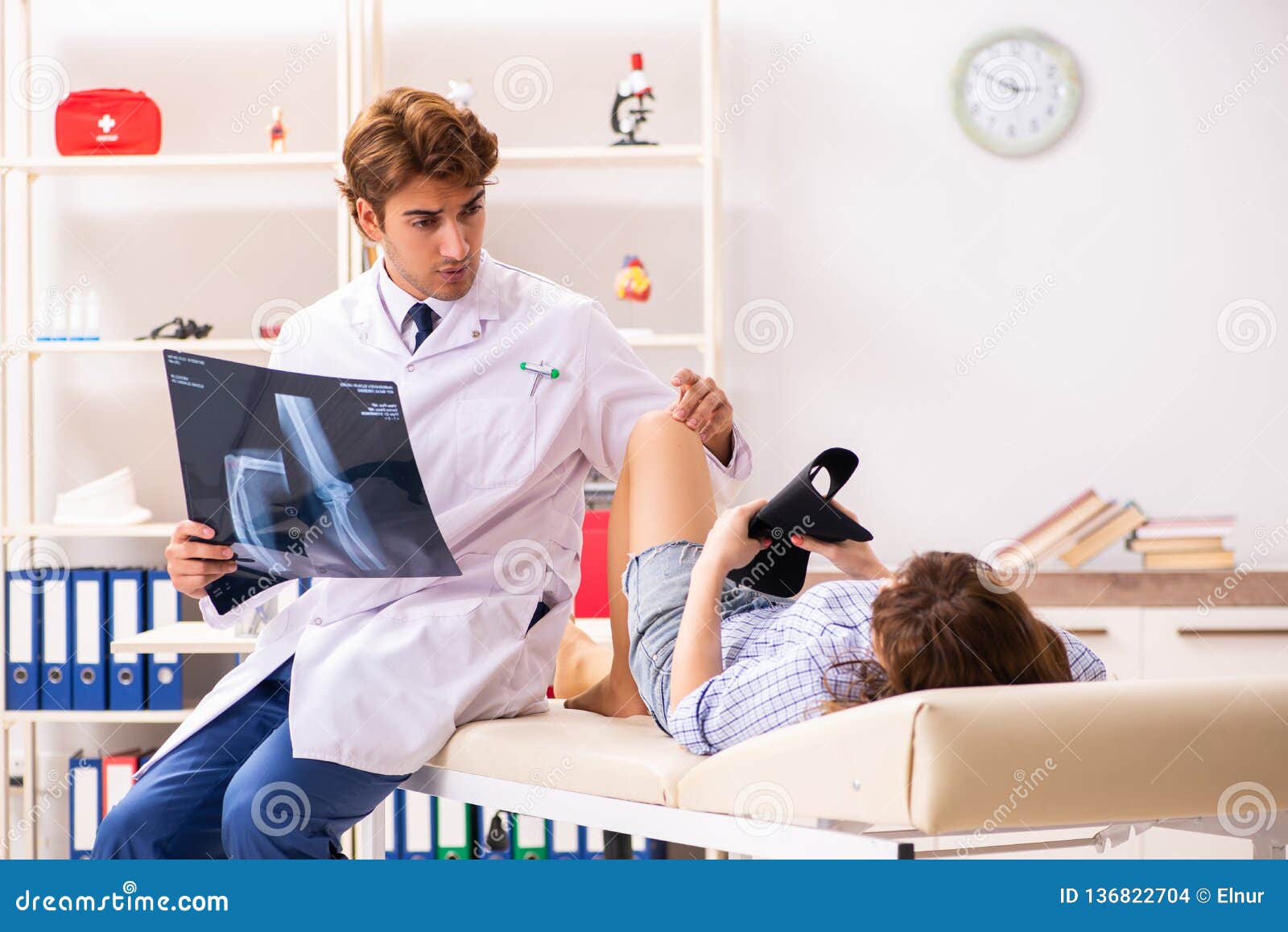 The Male Traumatologist Looking at Xray Images Stock Photo - Image of ...
