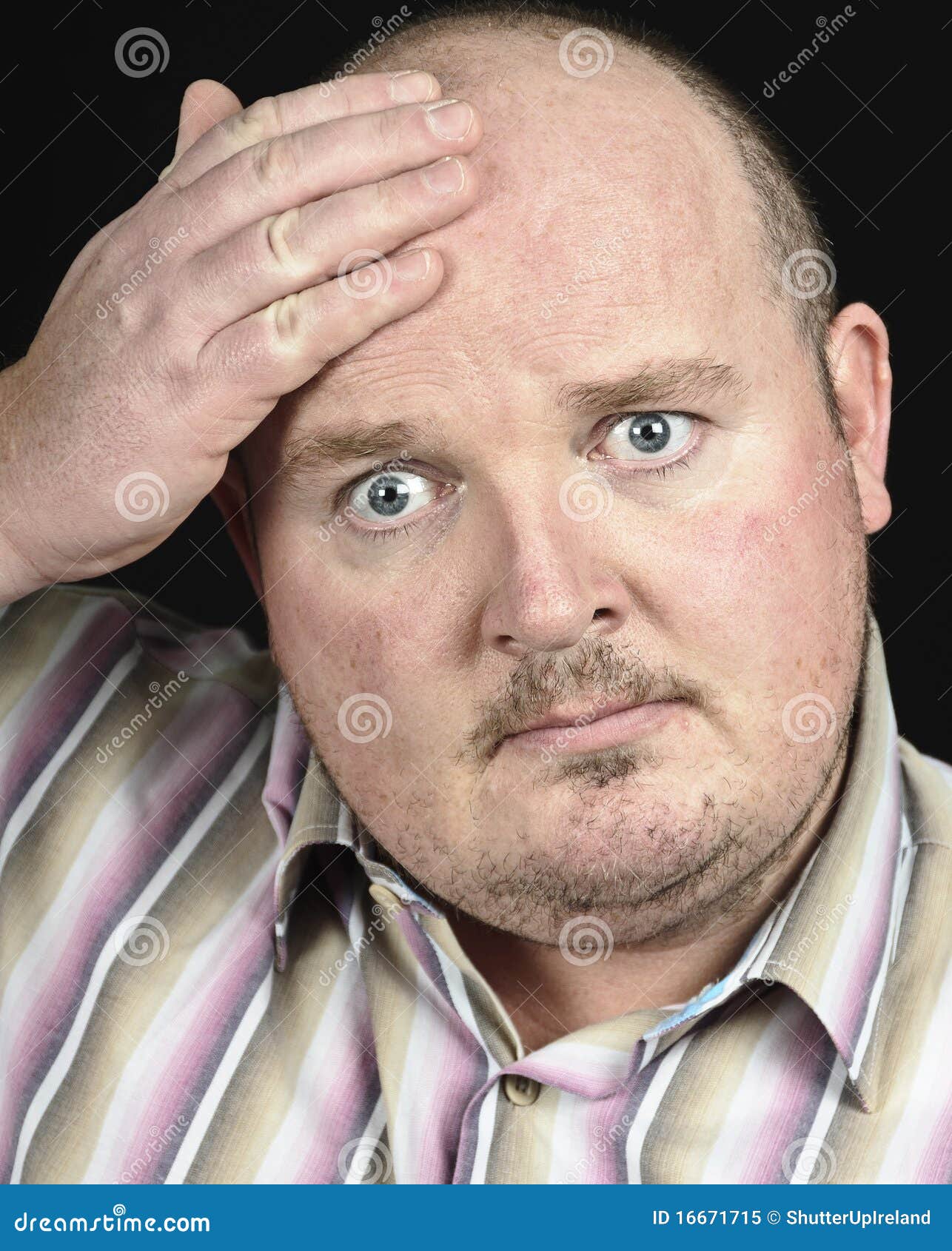 Male Under Strress with Hand To Head on Black Stock Image - Image of ...