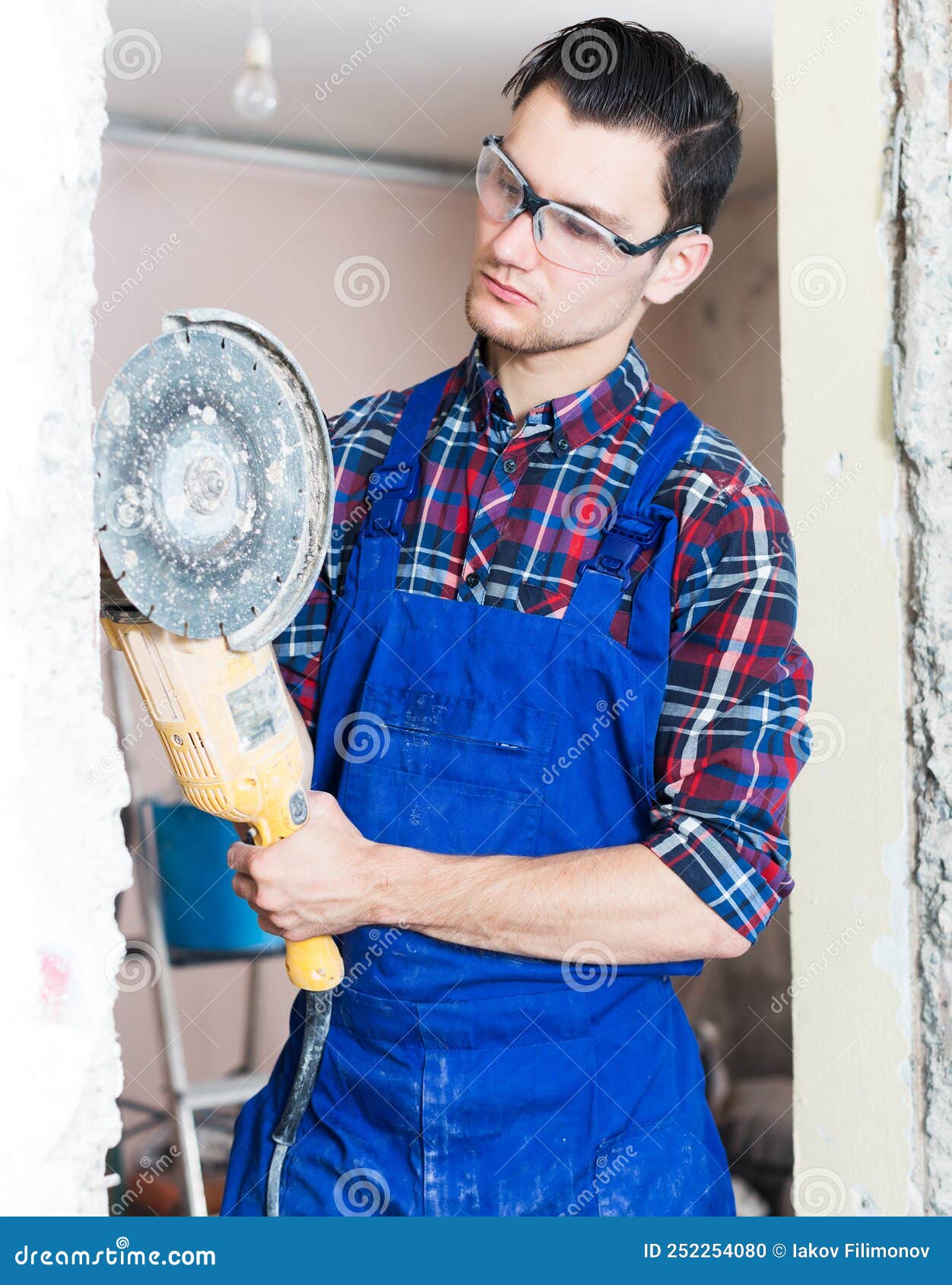 Male Using Professional Angle Grinder Stock Photo - Image of renovation ...