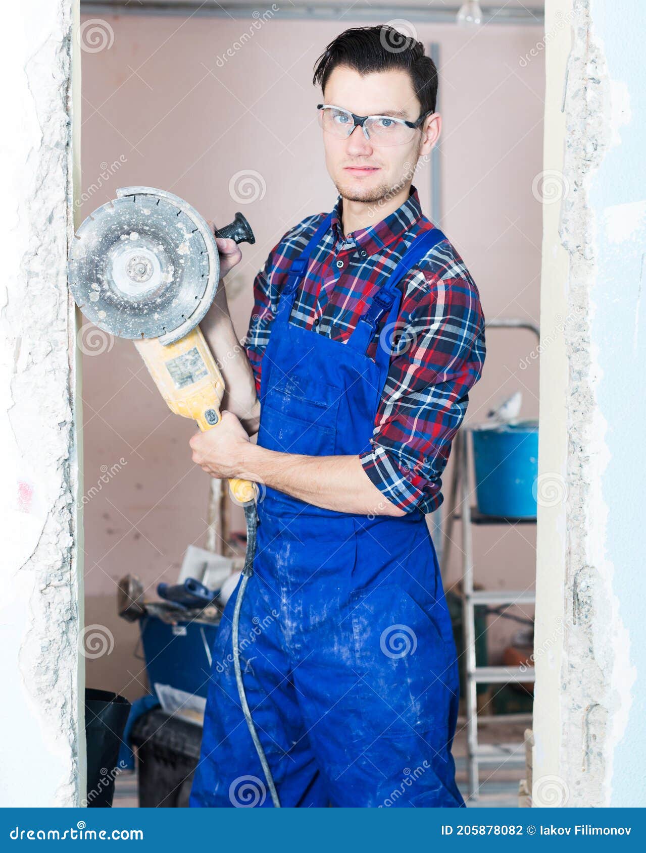 Male Using Professional Angle Grinder Stock Photo - Image of builder ...