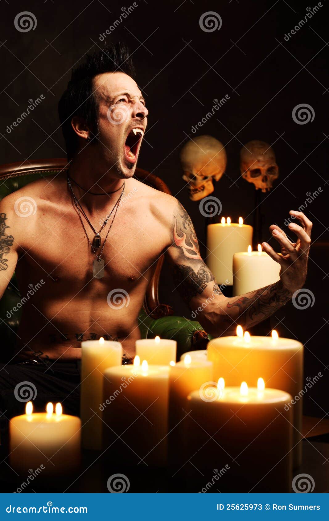 Male vampire showing teeth stock image. Image of teeth - 25625973