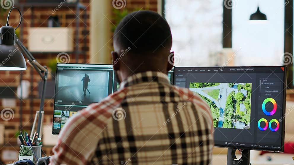 Male Video Creator Edits a Multimedia Project at a Modern Office Stock ...